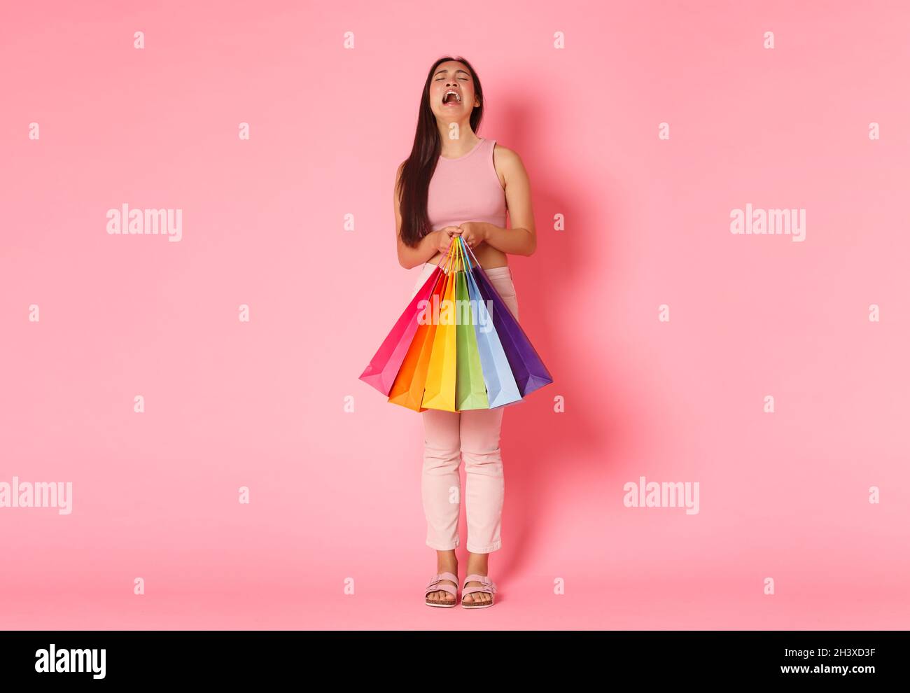 Full length portrait of crying and disappointed, whining asian girl ...