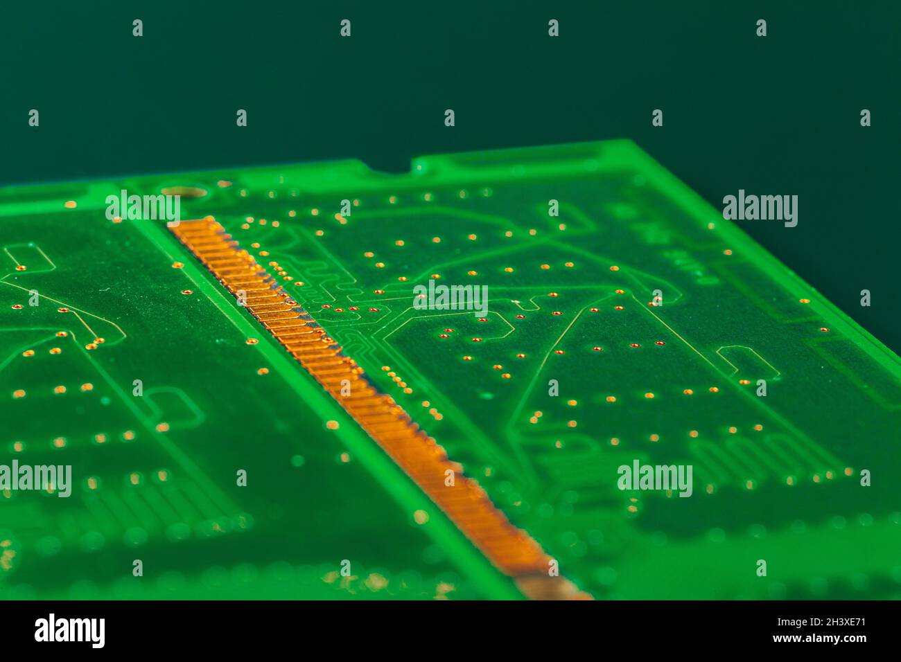 Green circuit board of a computer close up Stock Photo - Alamy