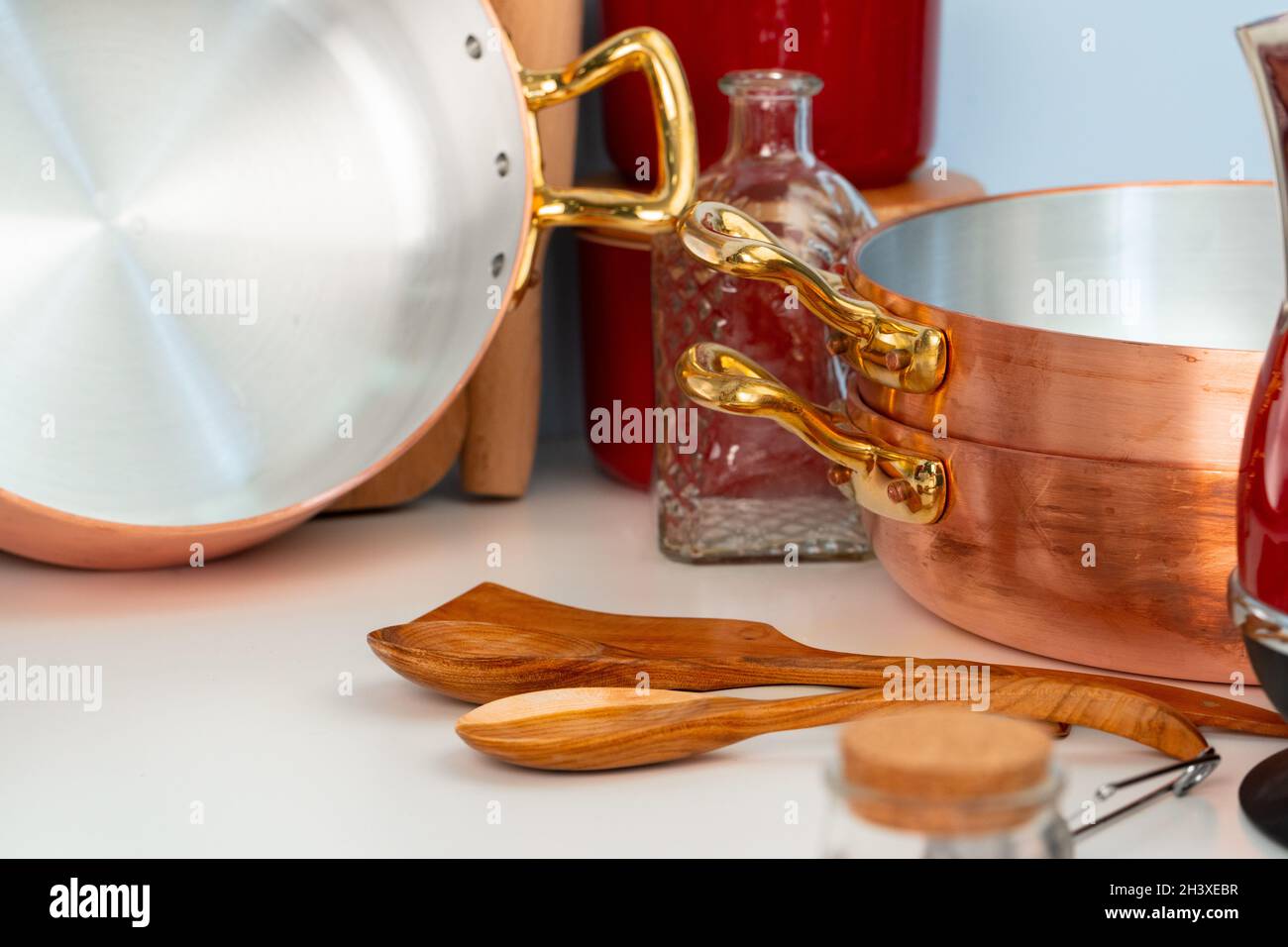 Clean cookware, utensils close up on table in modern kitchen Stock ...