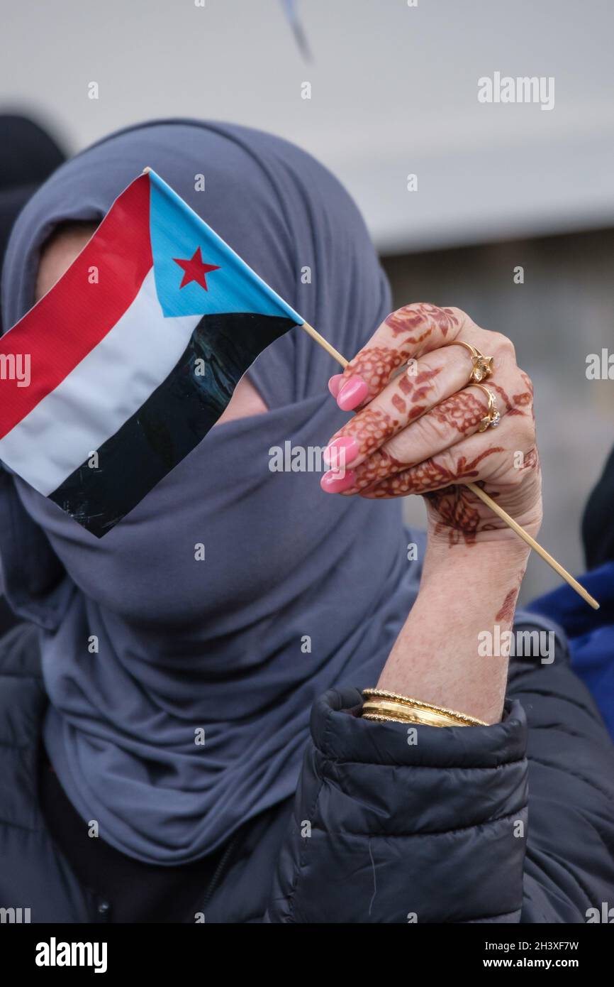 London, UK. 30th Oct 2021. Protesters at Downing St wave South Yemen ...