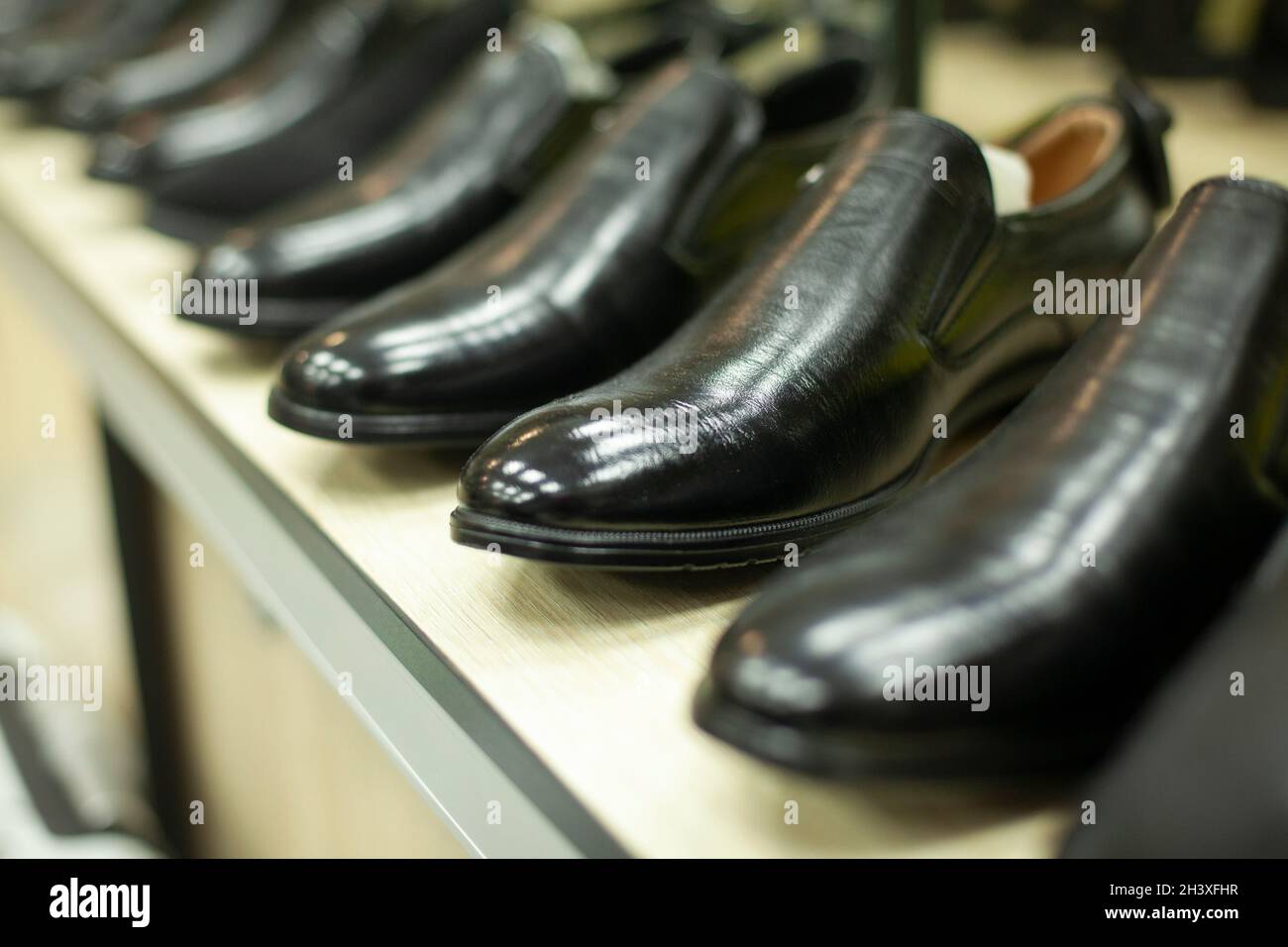 Row of shoes hi-res stock photography and images - Alamy