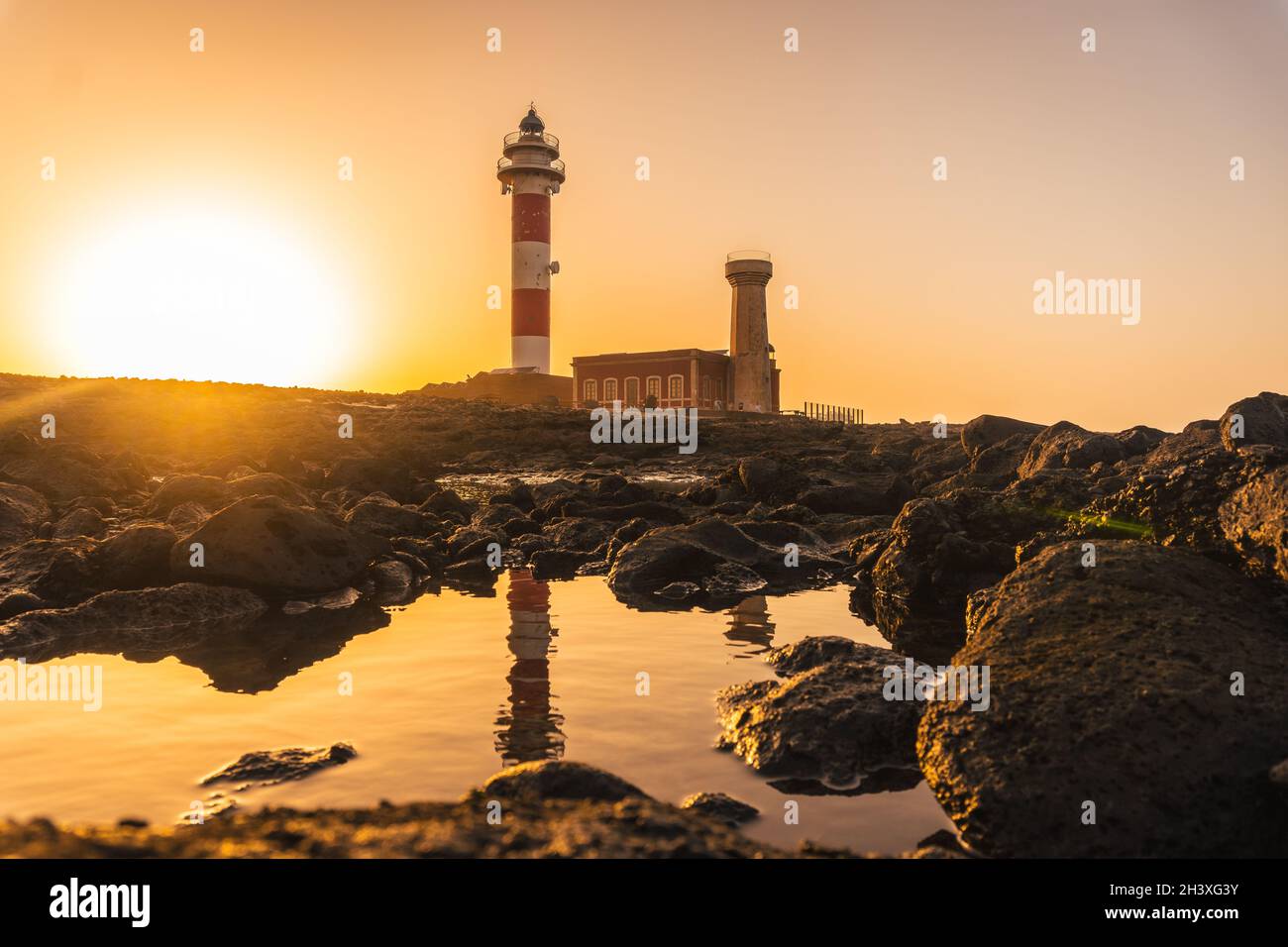 Beautiful view of the Toston Lighthouse at sunset in Punta Ballena ...
