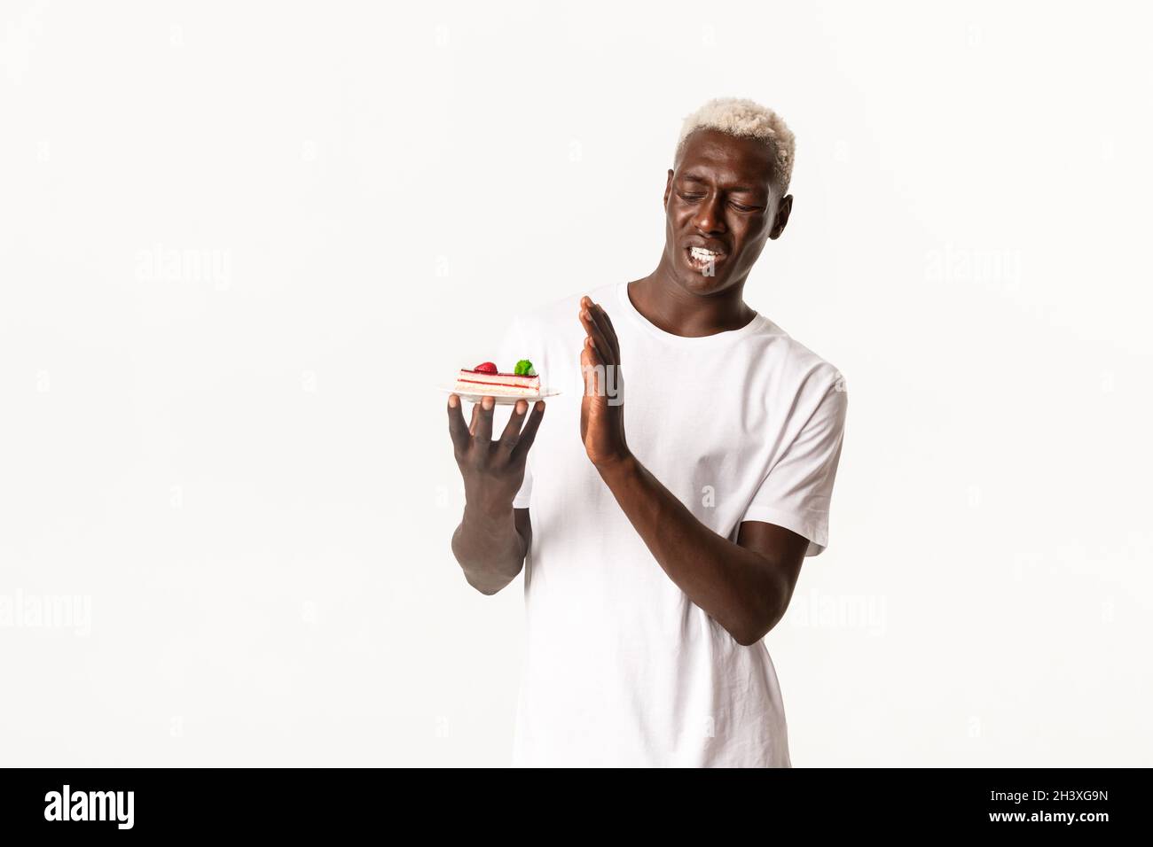 Portrait of disgusted handsome african american young blond man ...