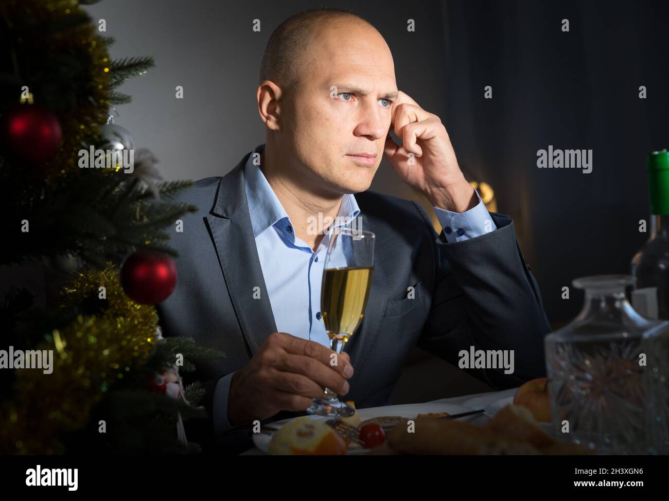 Tired man celebrating New Year Stock Photo - Alamy