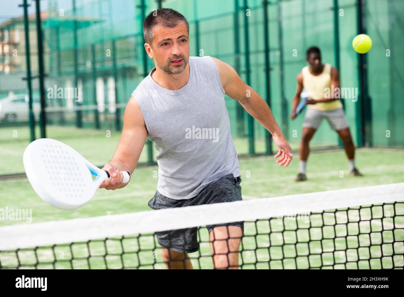 French couple playing tennis hi-res stock photography and images - Alamy