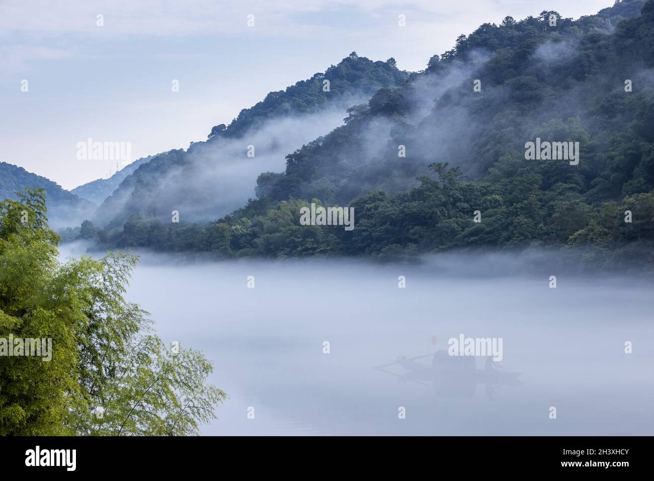Hunan little Dongjiang River in mist Stock Photo - Alamy