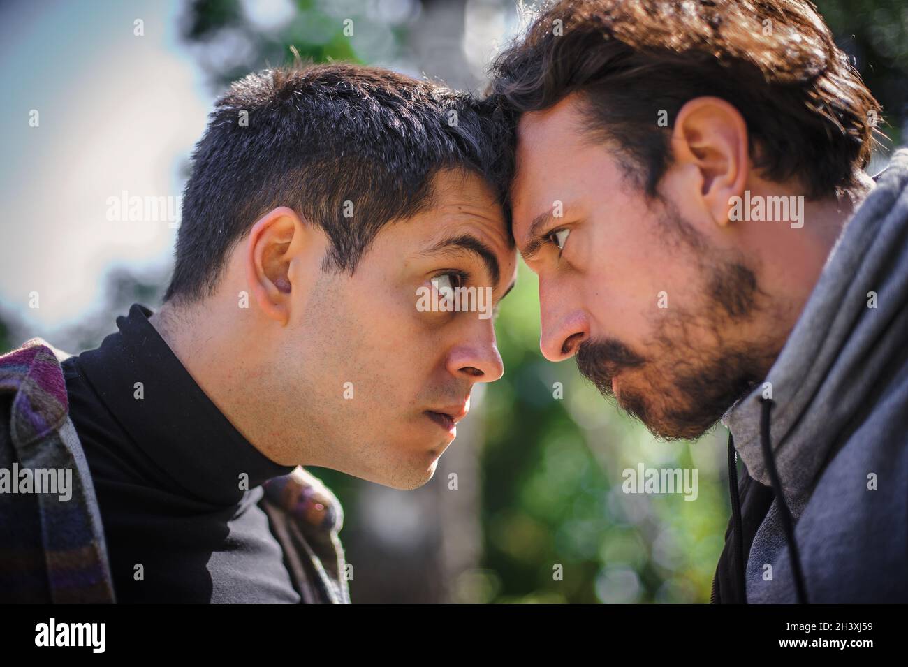 Head to head conflict close-up. Two very angry, nervous and upset men ...