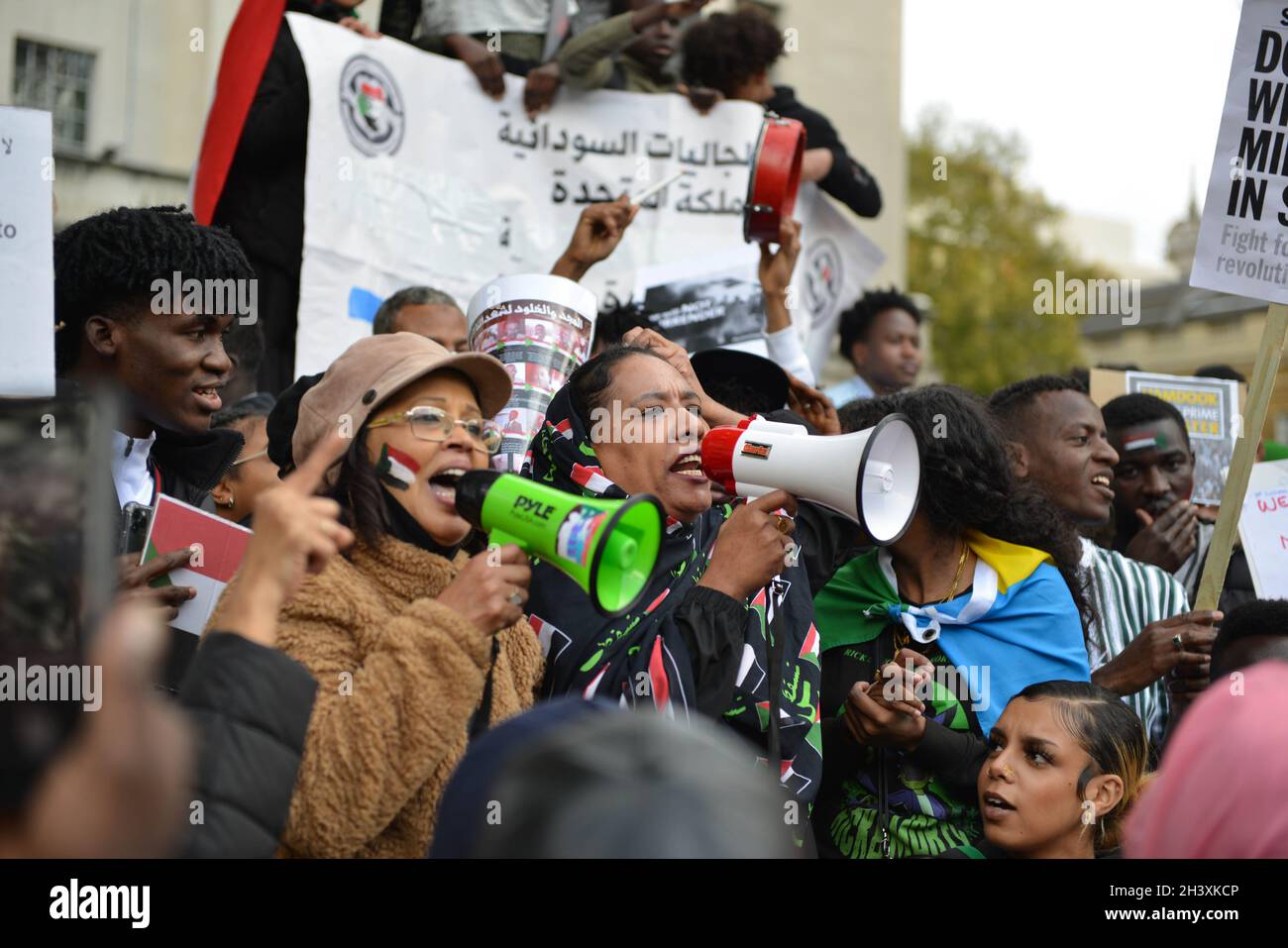 Protesters chant slogans on the megaphones during the demonstration ...