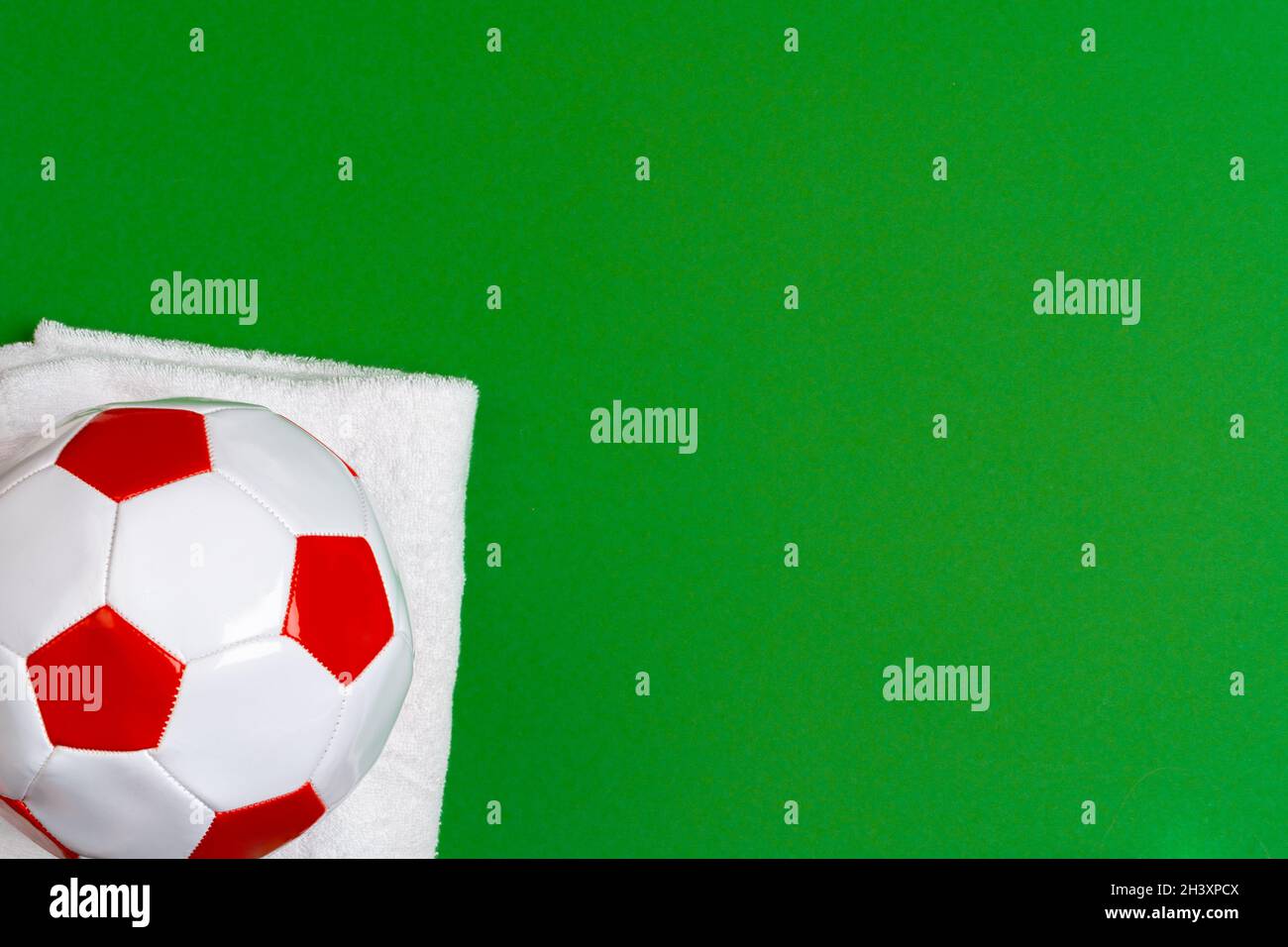 Red and white leather soccer ball, top view Stock Photo - Alamy