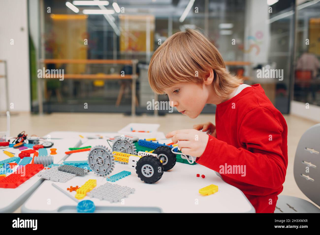 Little boy kid child constructor checking technical toy. Children ...