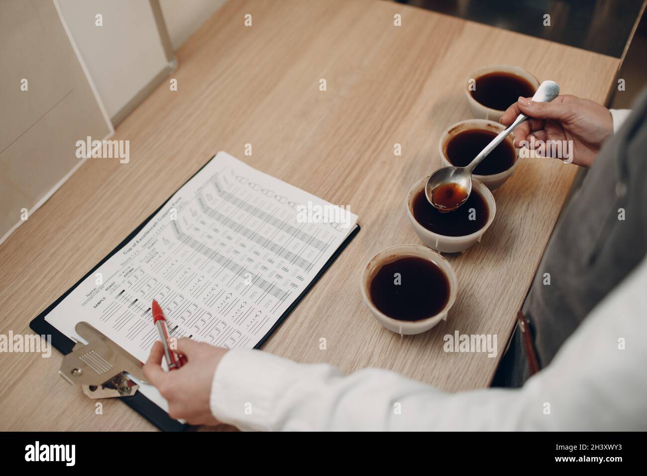 Cup Taster Girl Tasting Degustation Coffee Quality Test. Coffee Cupping ...