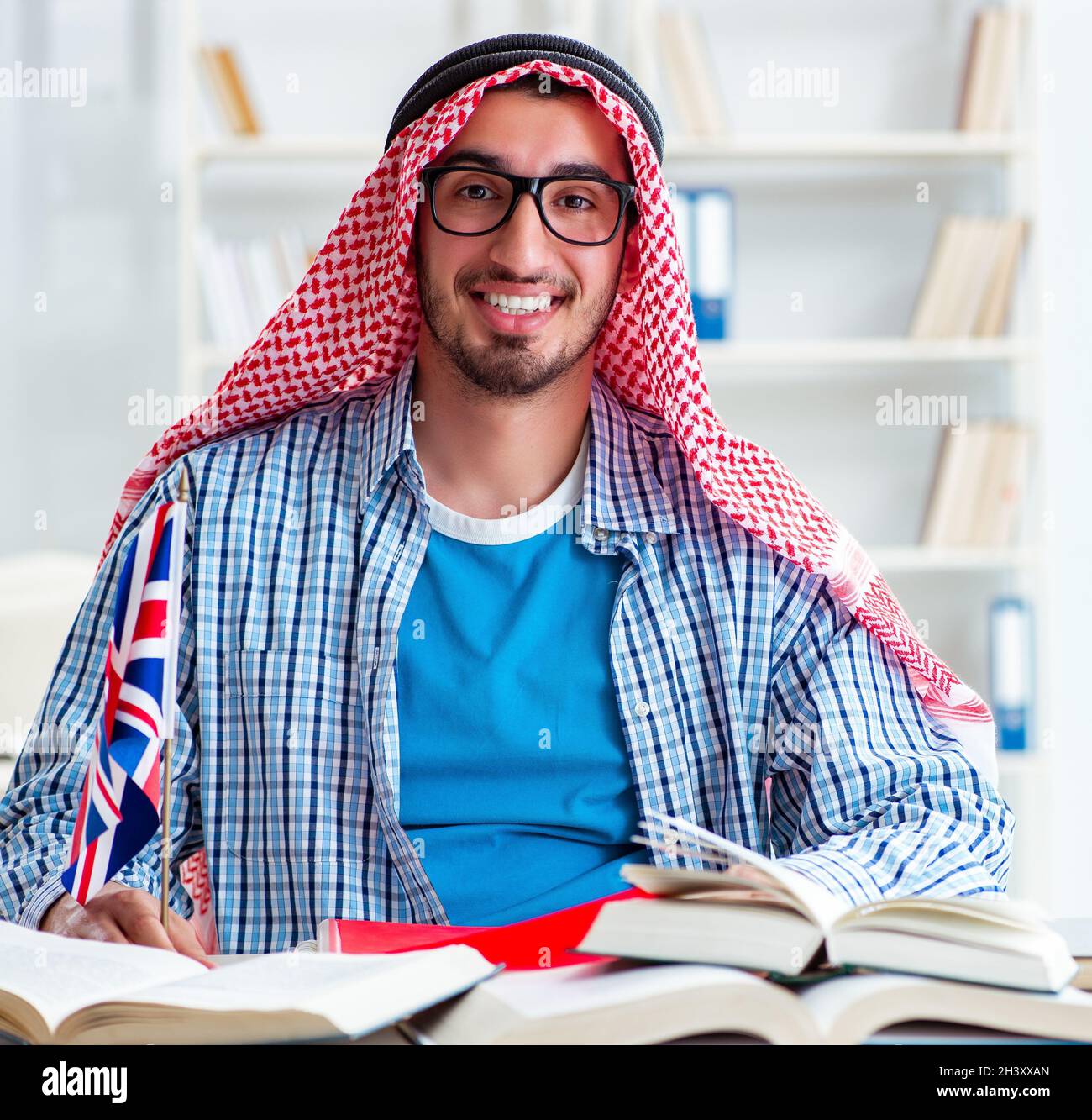 Arab student studying english language Stock Photo - Alamy