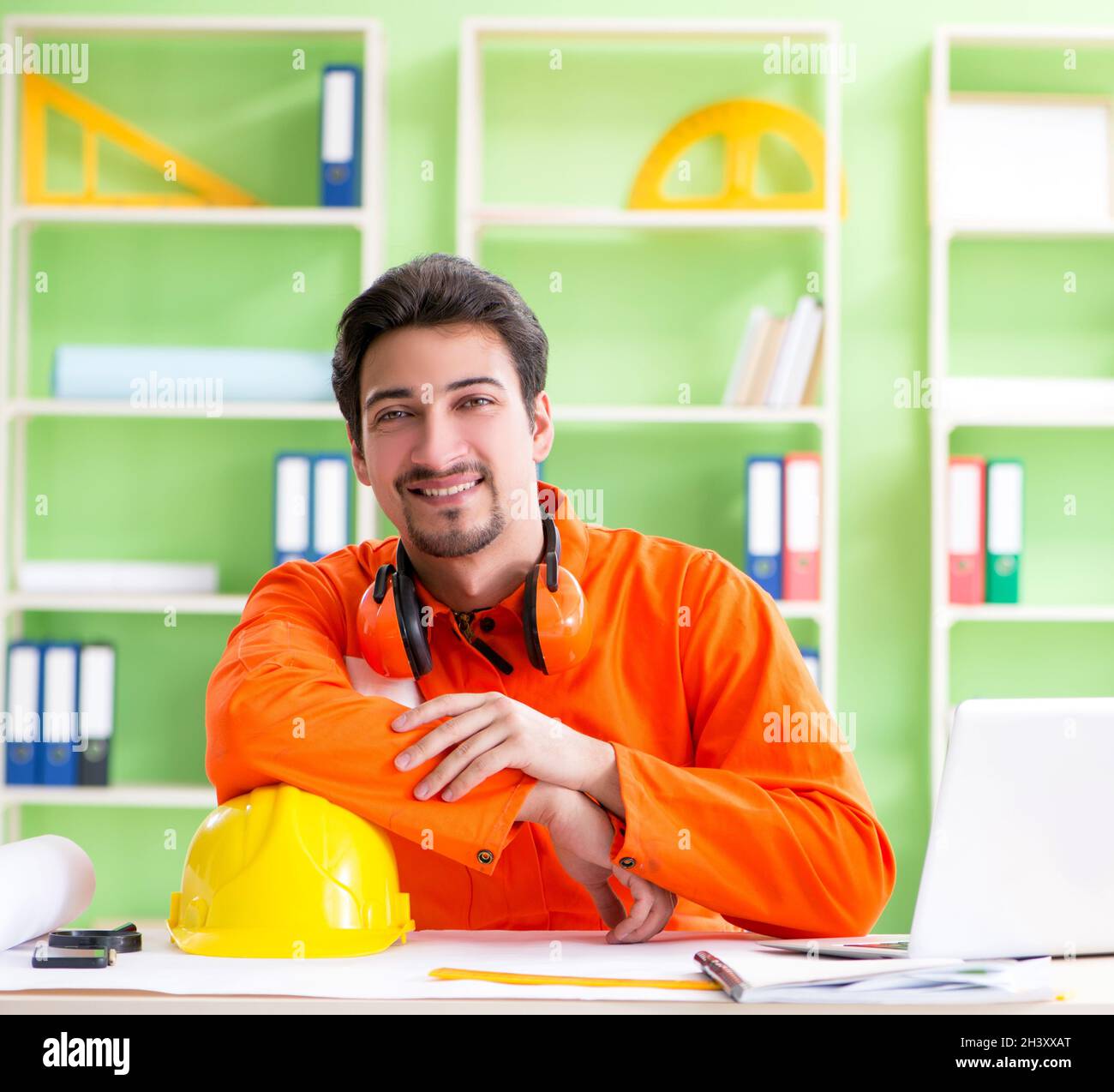 Construction supervisor planning new project in office Stock Photo - Alamy