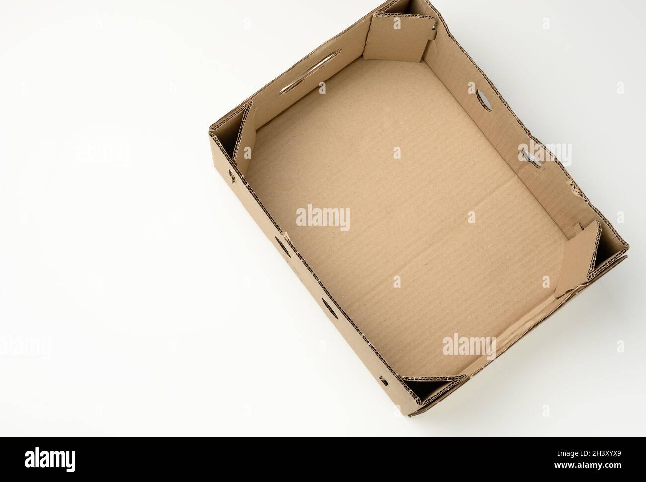 Rectangular empty cardboard box of brown paper on a white background ...