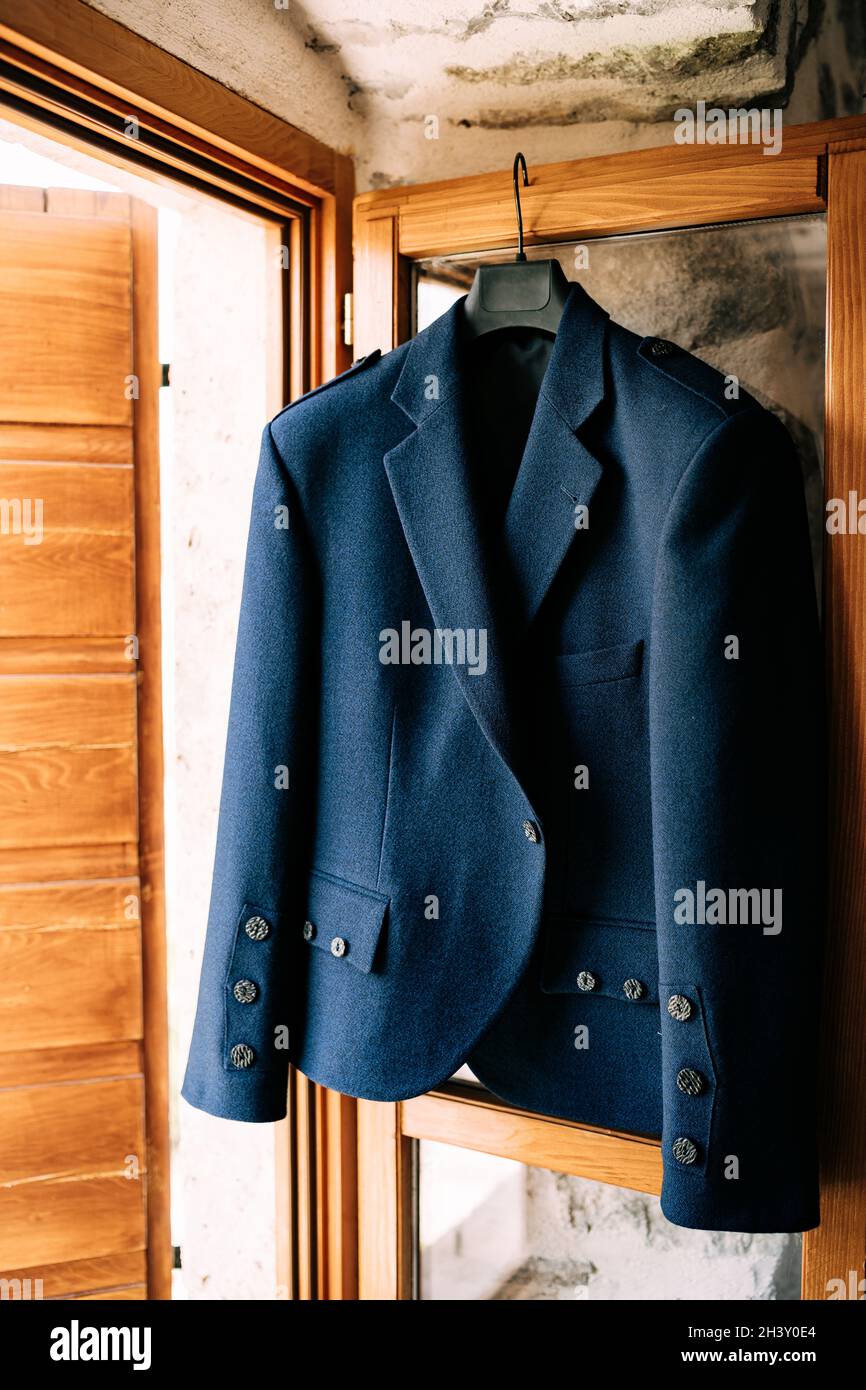 Hanging groom suit hi-res stock photography and images - Alamy