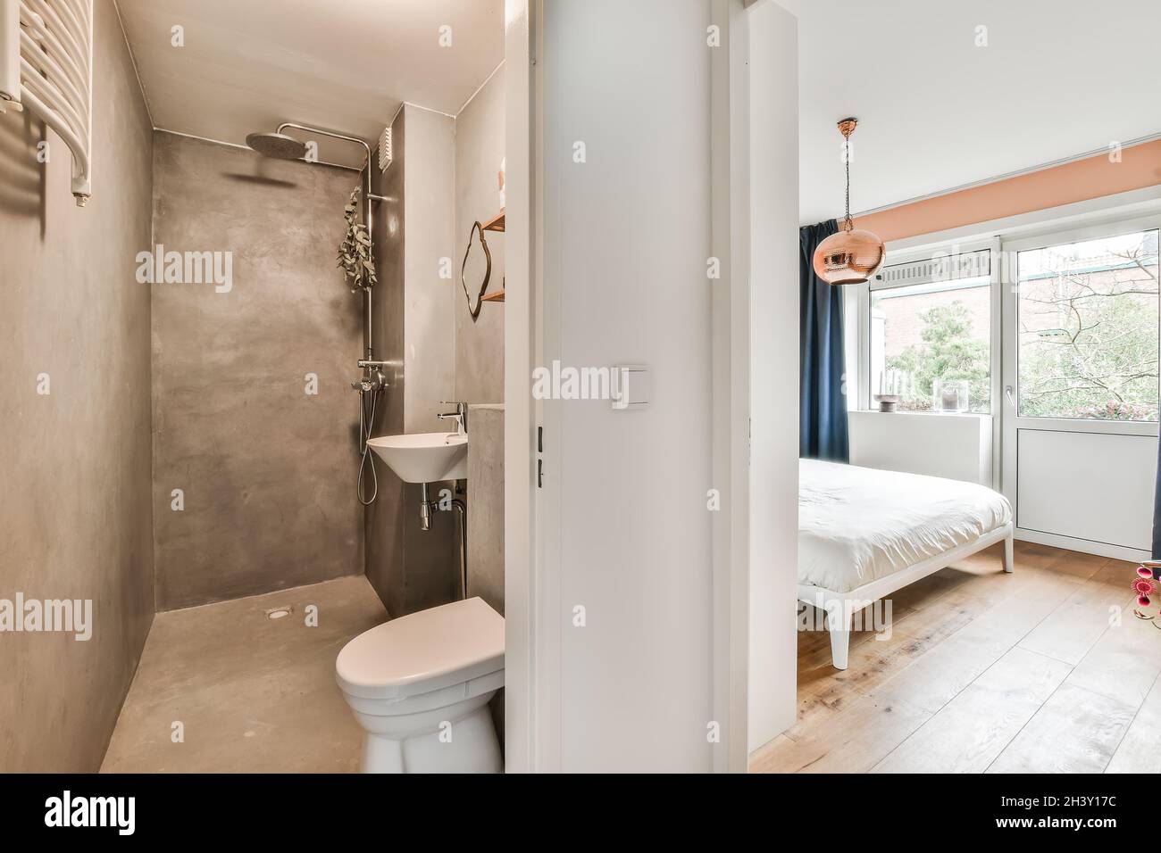 Interior of small clean restroom in miniature style Stock Photo - Alamy