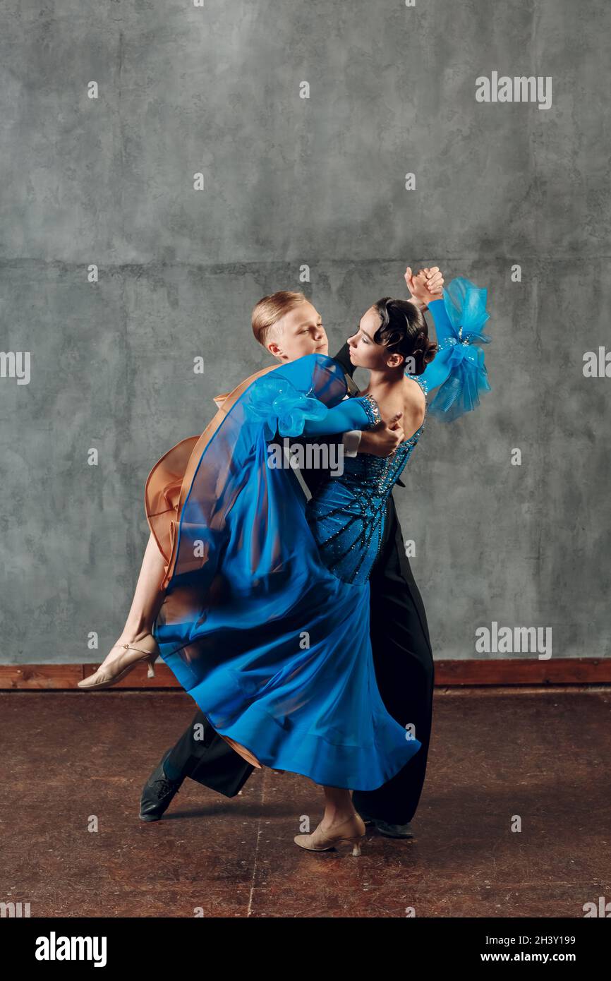 Ballroom dance. Young man and woman dancing foxtrot Stock Photo - Alamy