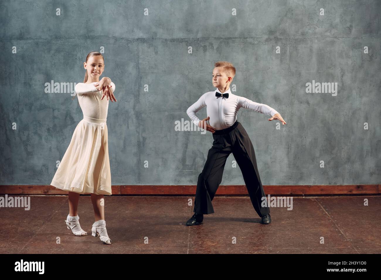 Young couple boy and girl dancing in ballroom dance Samba Stock Photo ...