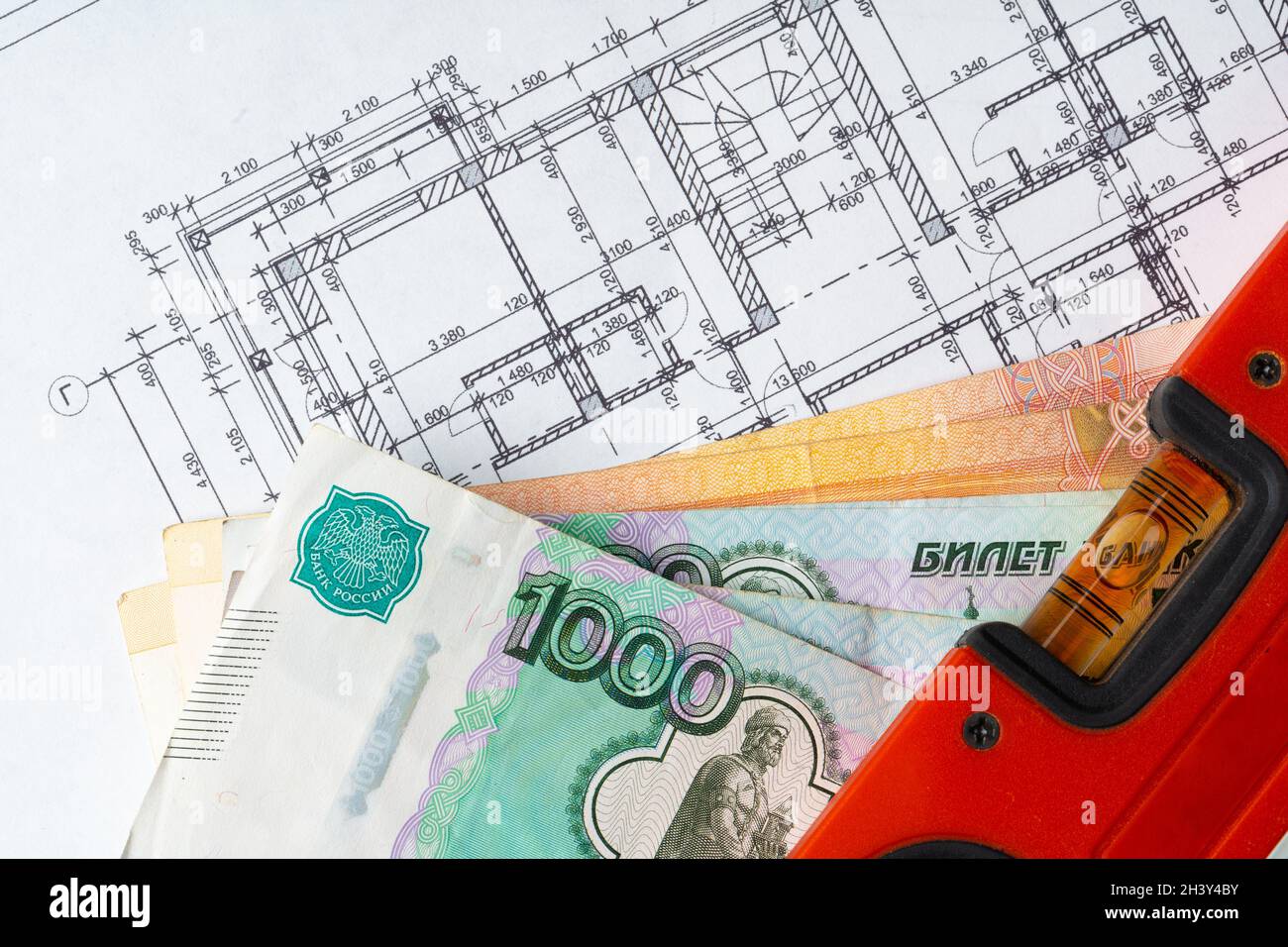 Architectural drawing and Russian Ruble money stack Stock Photo - Alamy