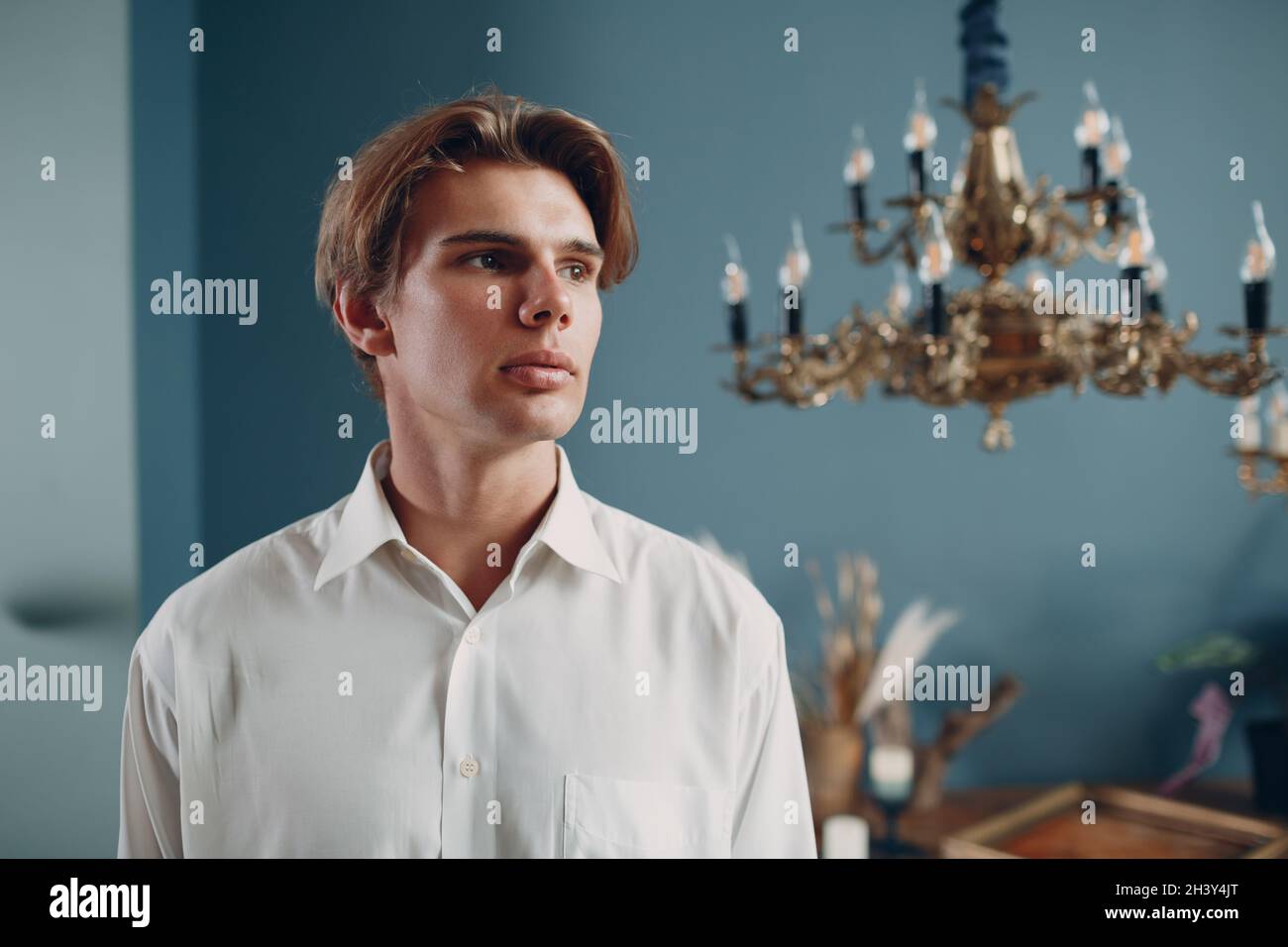 Handsome young guy standing hi-res stock photography and images - Alamy