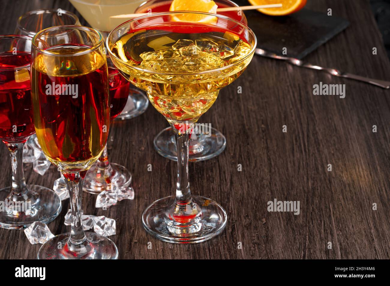 Selection of alcohol drinks in different glasses Stock Photo - Alamy