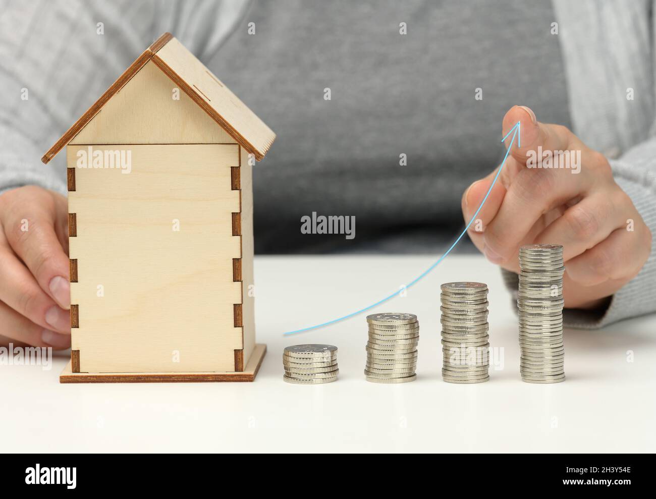 Miniature house model coins hi-res stock photography and images - Alamy