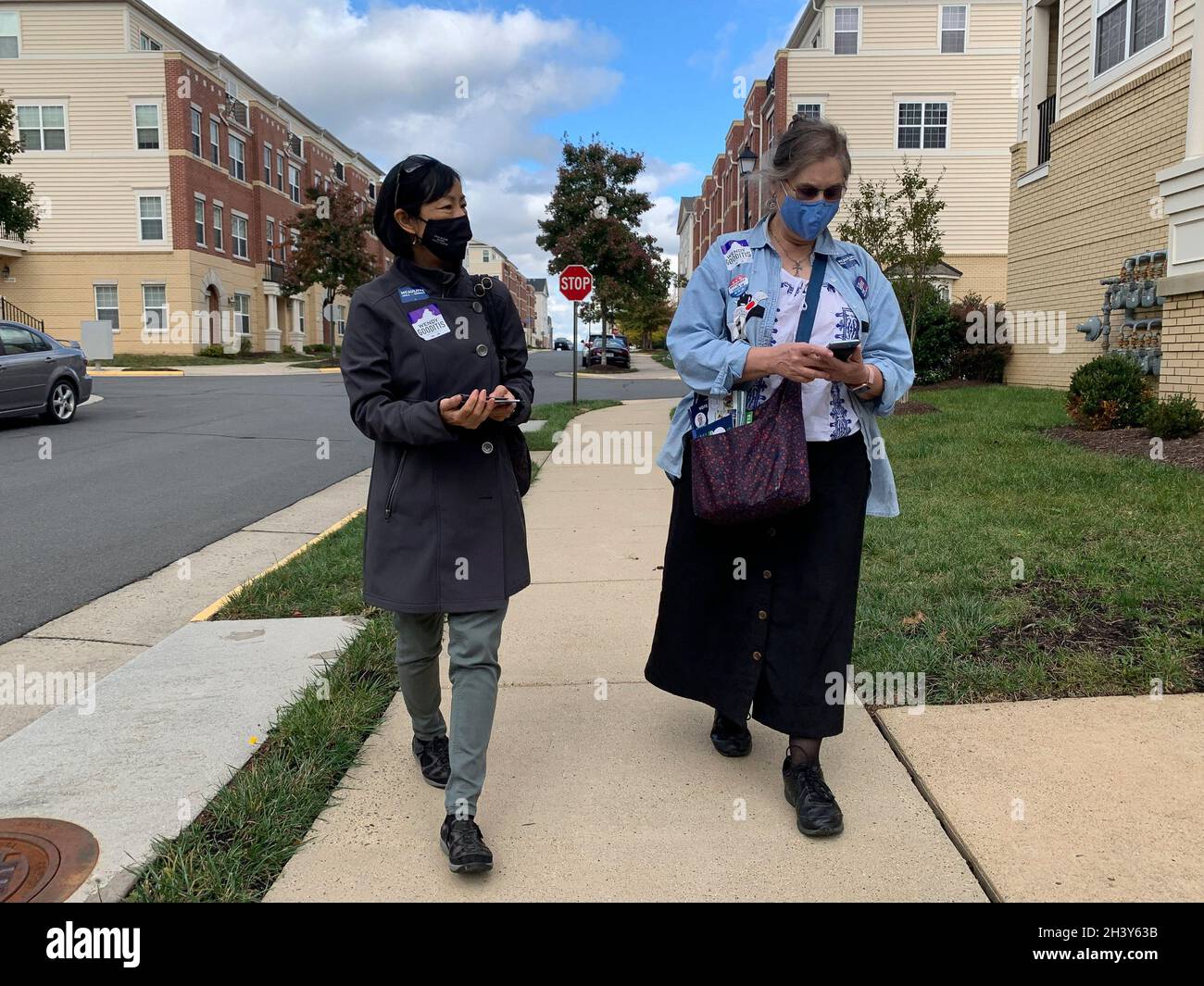 October 30, 2021, Brambleton, Virginia, USA: Volunteers Marcia Lim and ...
