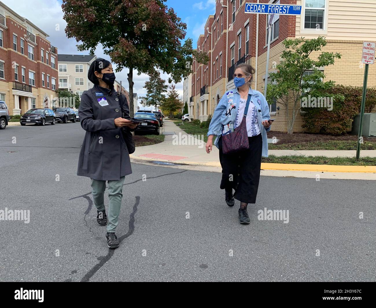 October 30, 2021, Brambleton, Virginia, USA: Volunteers Marcia Lim and ...