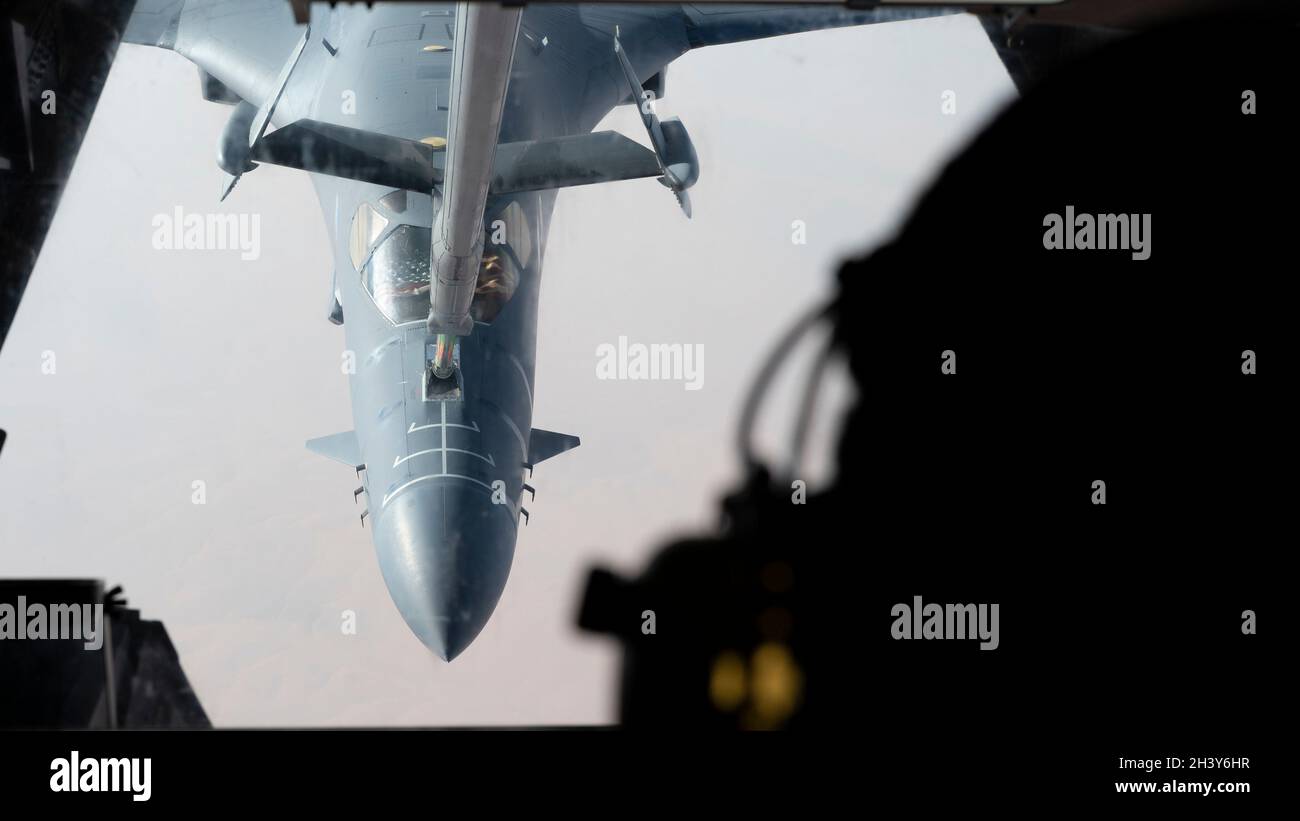 A U.S. Air Force B-1B Lancer is refueled by a U.S Air Force KC-10 ...