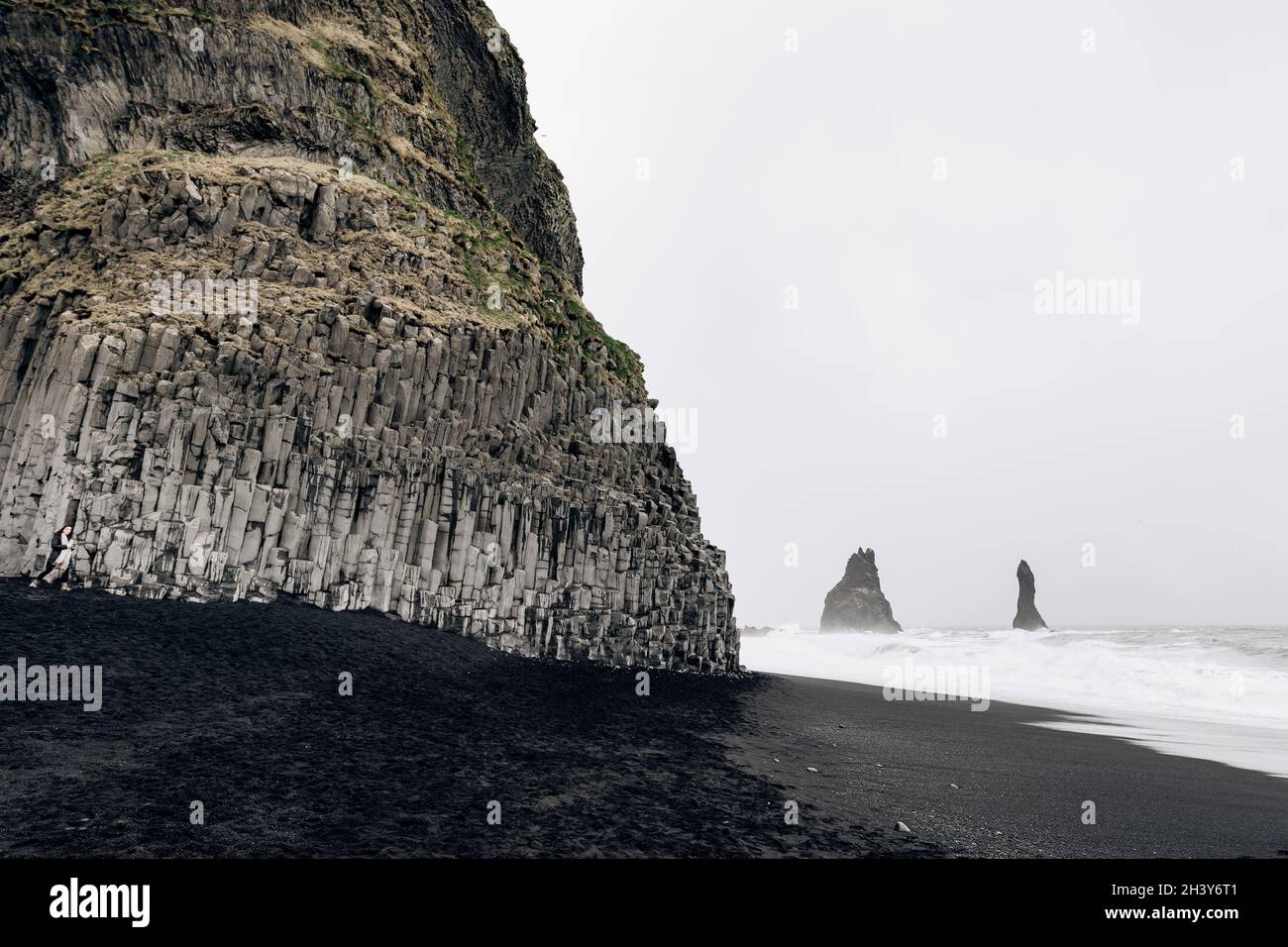 Black Beach Vik in Iceland. Waves of the Atlantic Ocean. Basalt pillars ...