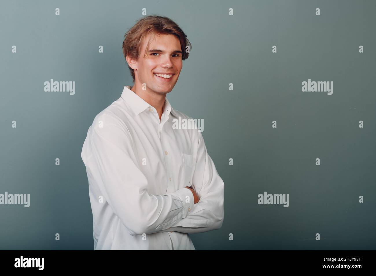 Portrait young man standing portrait at studio Stock Photo - Alamy
