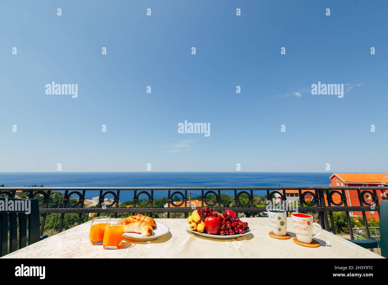 Breakfast for two on the balcony overlooking the sea Stock Photo - Alamy