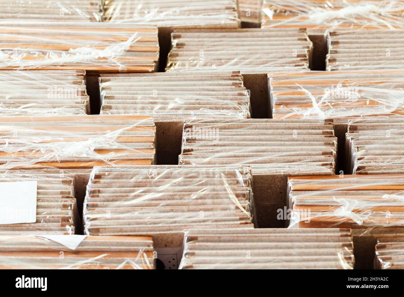 Cardboard sheets pack on a shelf of warehouse Stock Photo - Alamy