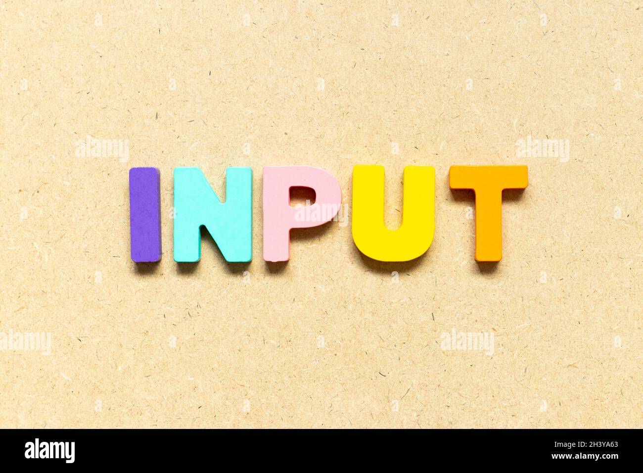 Color alphabet letter with word input on wood background Stock Photo ...