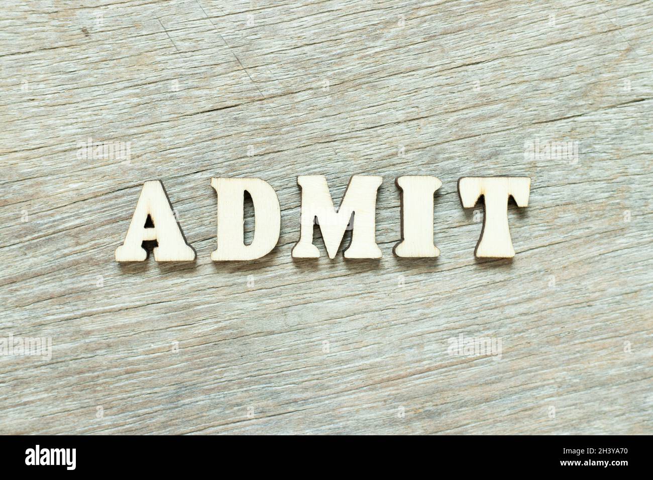 Alphabet letter in word admit on wood background Stock Photo - Alamy