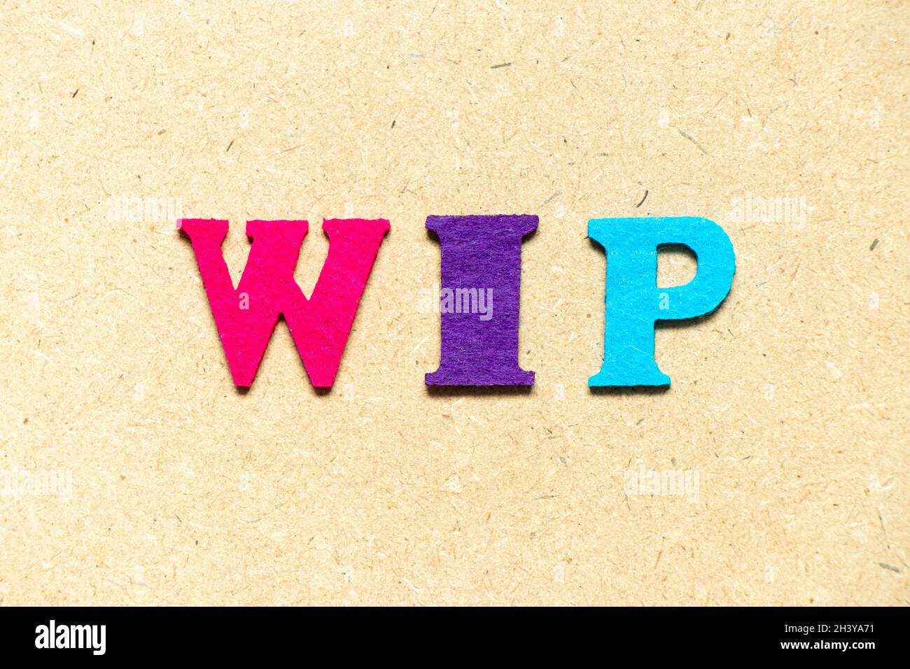 Color cloth alphabet letter in word WIP (Abbreviation of work in ...