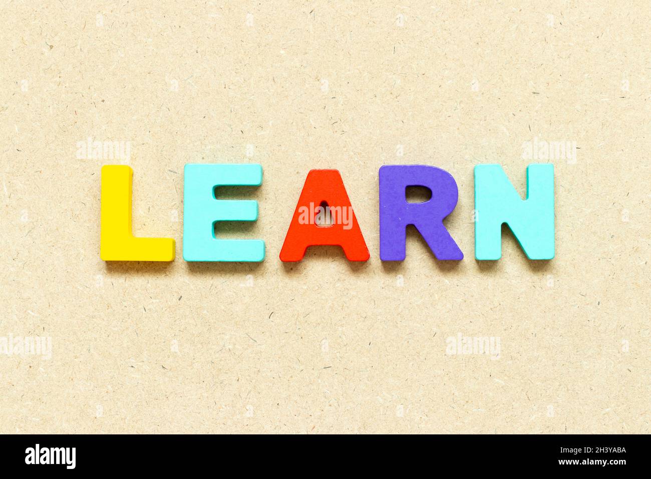 Color alphabet letter with word learn on wood background Stock Photo ...