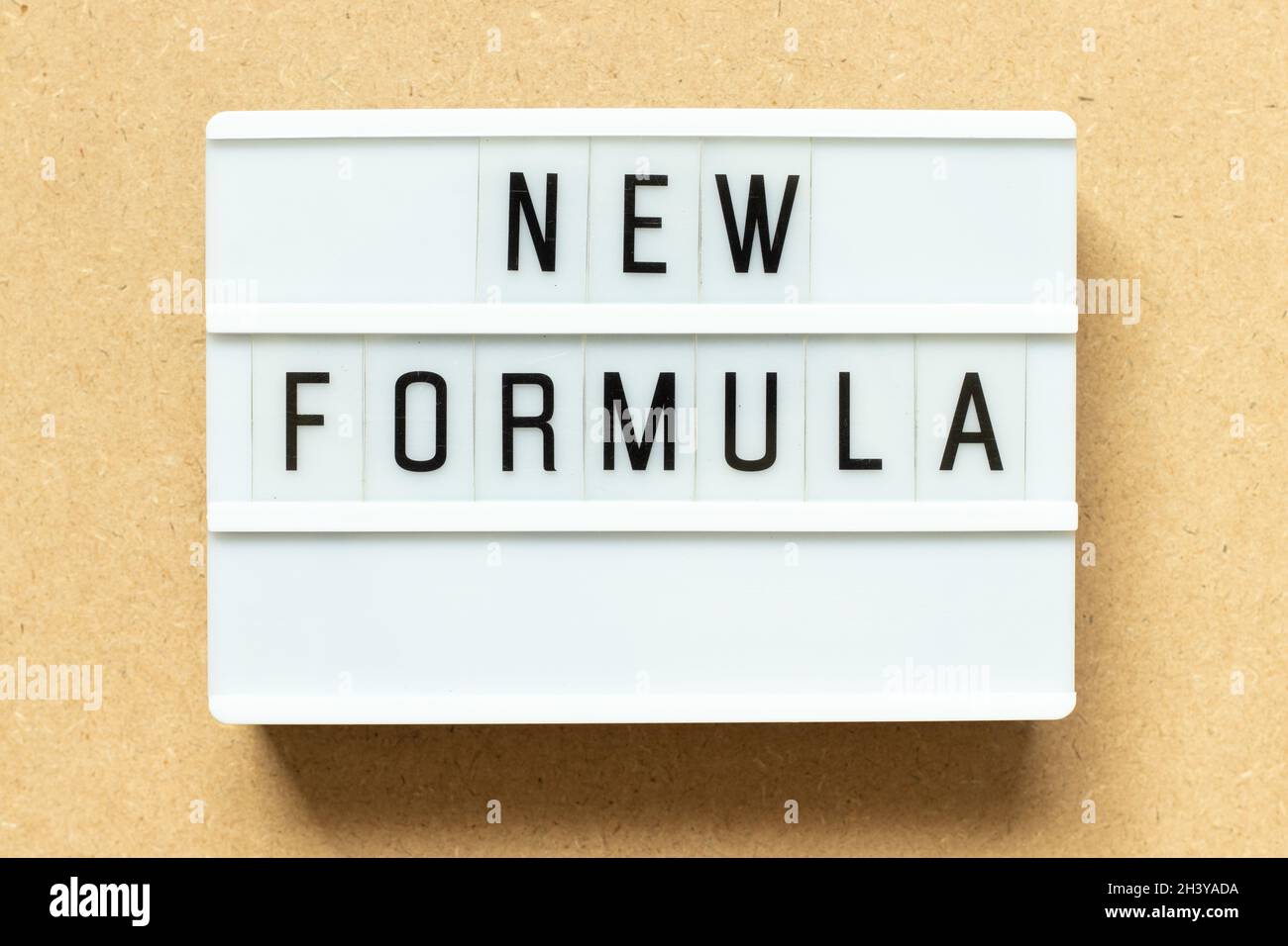 Lightbox with word new formula on wood background Stock Photo - Alamy
