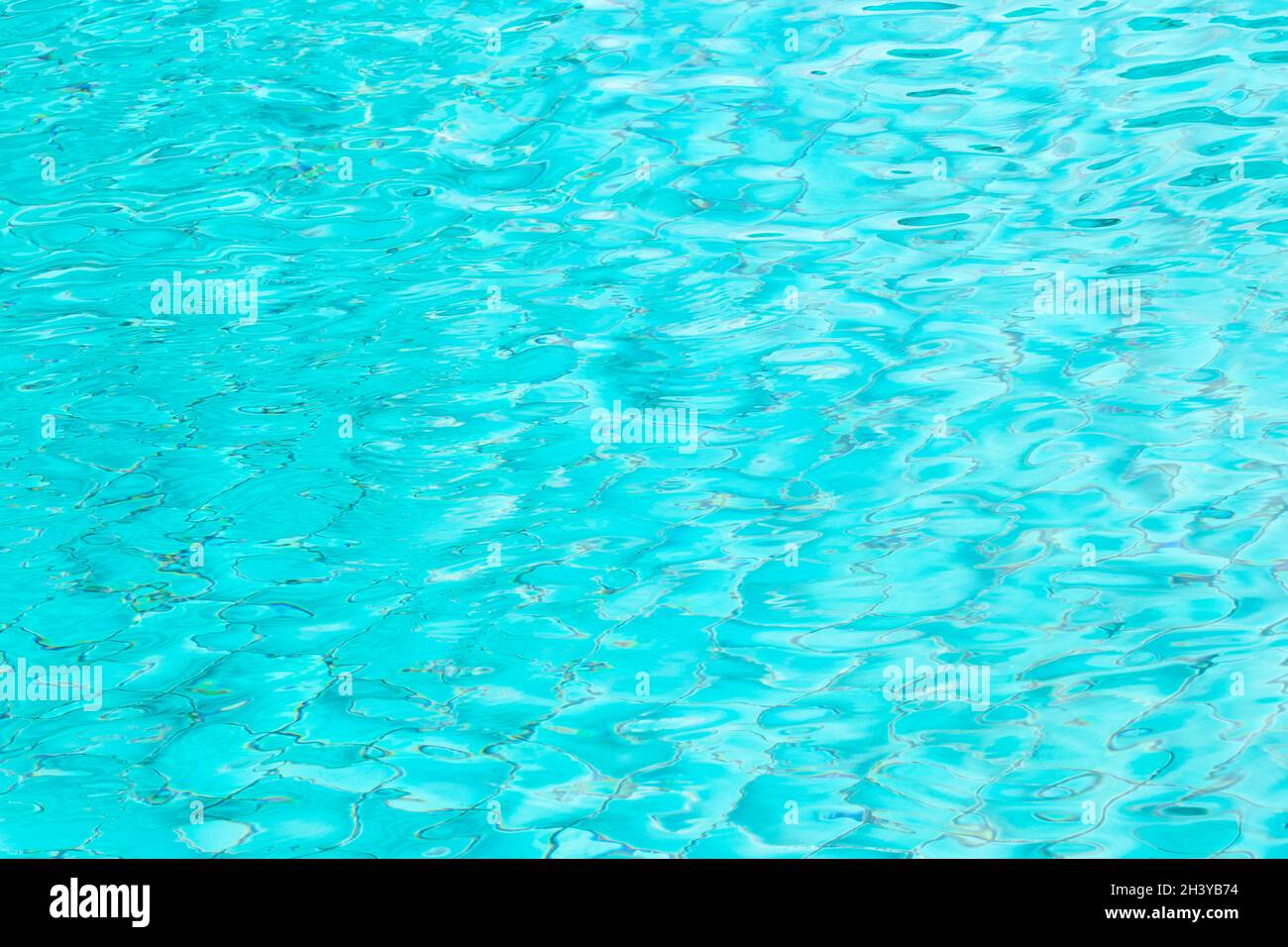 Ripple Water in swimming pool with blue tile floor background Stock ...