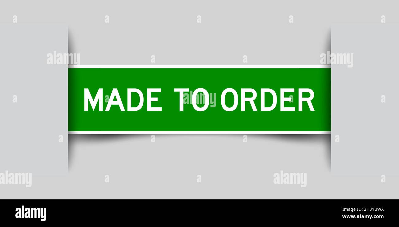 Inserted green color label sticker with word made to order on gray ...