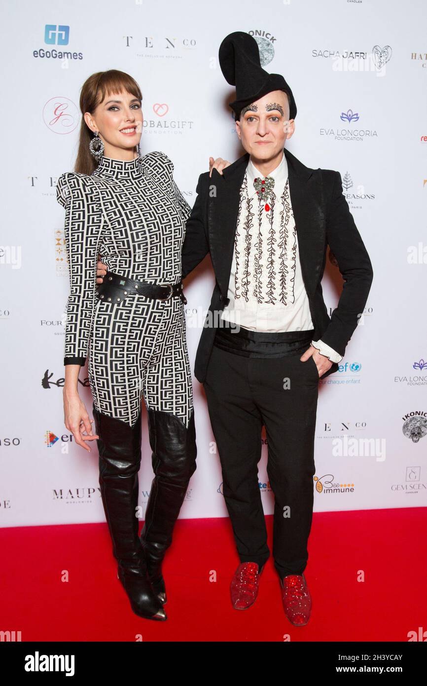 Frederique Bel, Ali Mahdavi attends the photocall during the Global ...