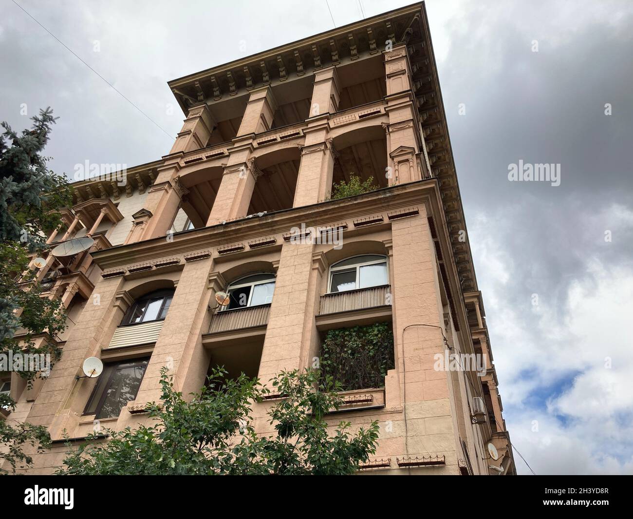 Facade of a multi-storey panel building. Residential building with many ...