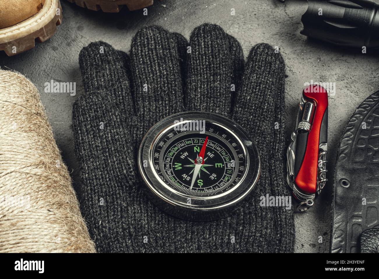 Still life of tools for hiking or travelling with compass Stock Photo ...
