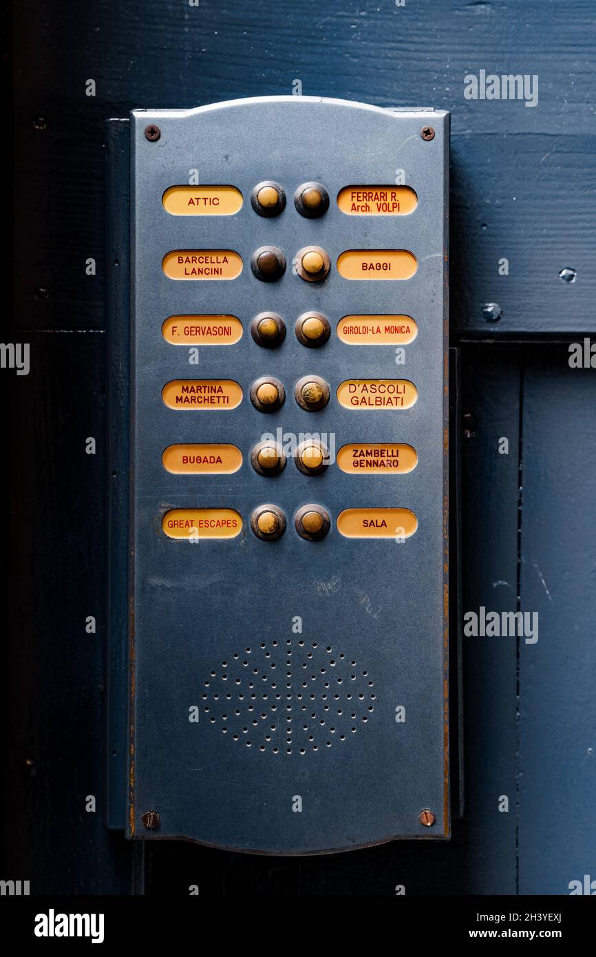 Venice, Italy - 25 july 2020: Blue door intercom with yellow buttons ...