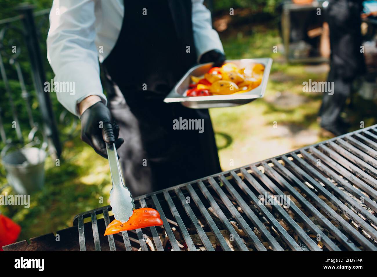 Hot open food catering grilled vegetables the waiter fries Stock Photo ...