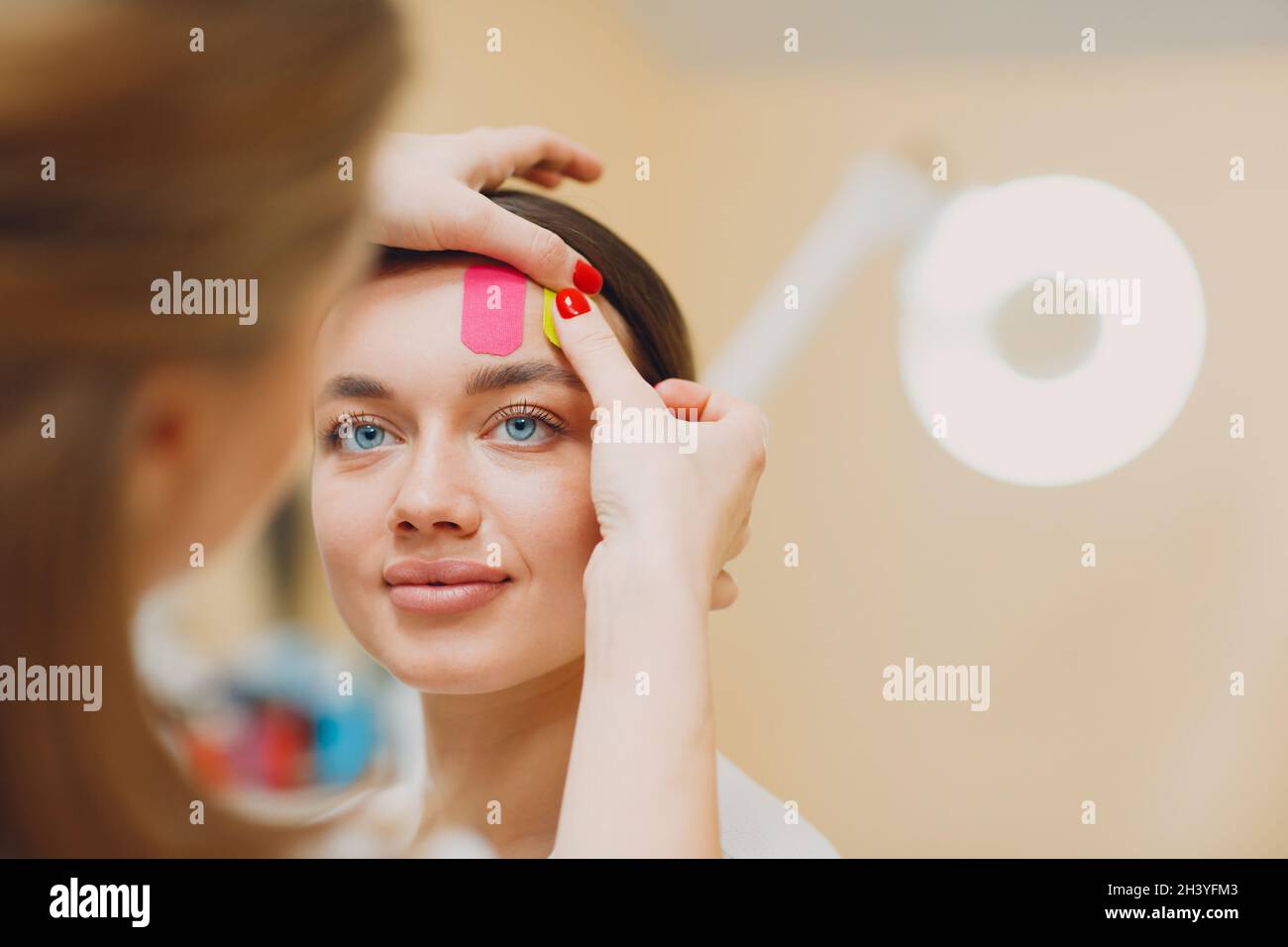 Woman lifting face hi-res stock photography and images - Alamy