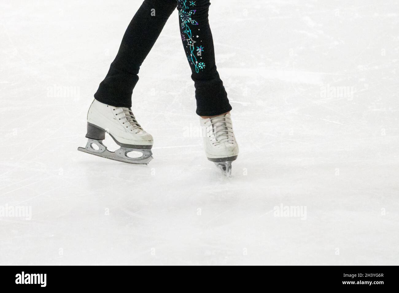 View of figure skater feet at the figure skating practice Stock Photo ...
