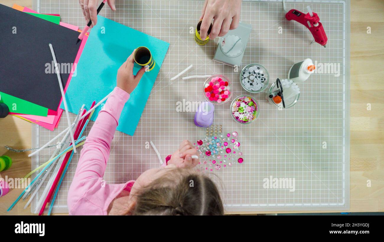 Flat lay. Kids papercraft. Making paper bugs out of the empty toilet ...