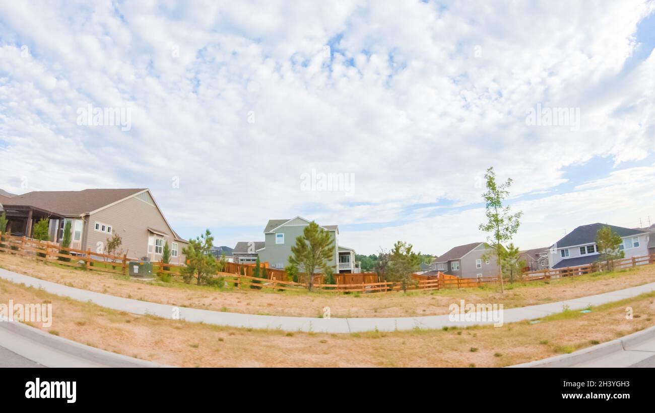 View of the typical suburban neighborhood on a summer morning Stock ...