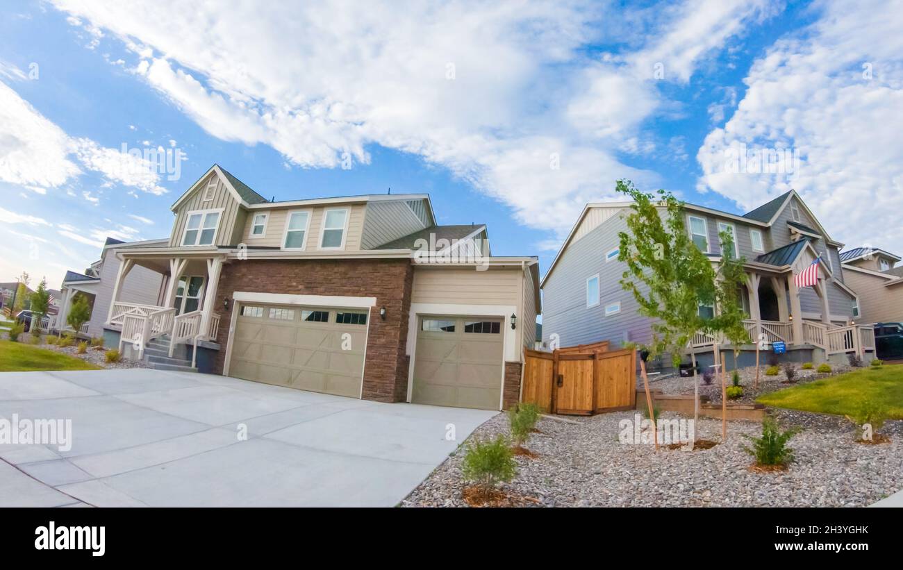 View of the typical suburban neighborhood on a summer morning Stock ...